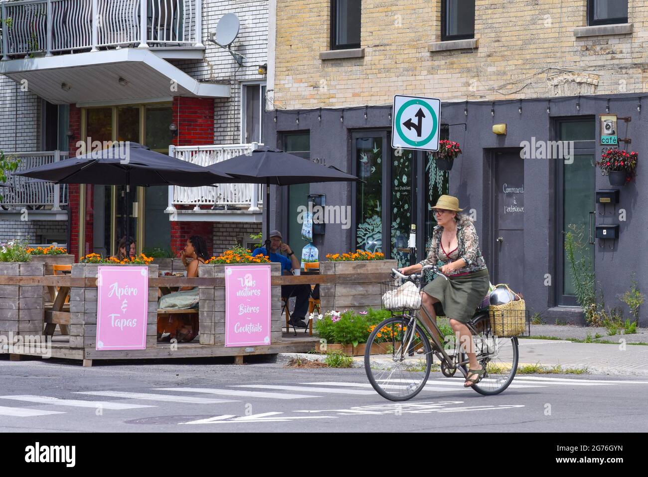 Woman riding a bicycle, Montreal Canada Stock Photo - Alamy