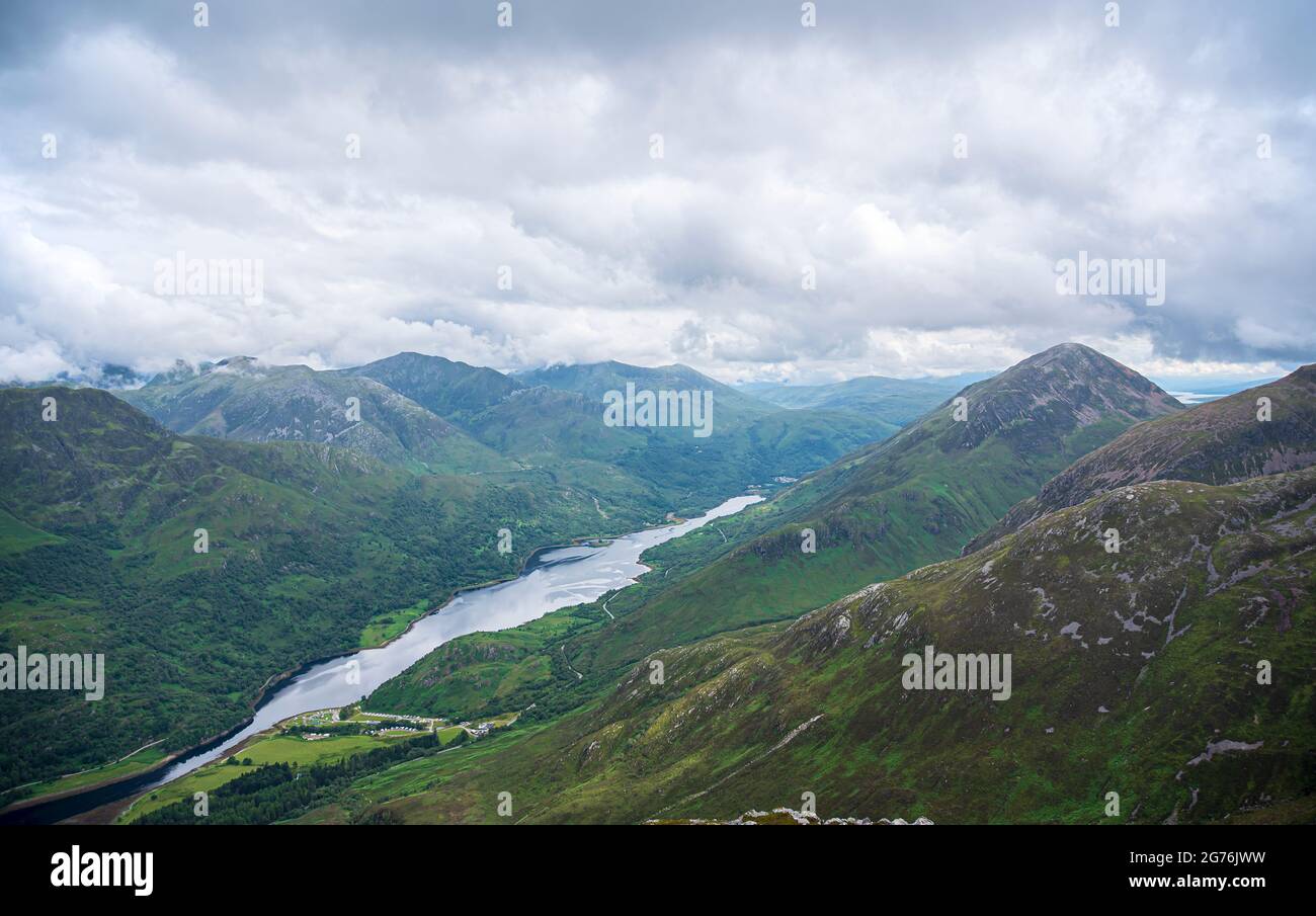 Landscape photography of mountains, lake, village, Glencoe, Scotland ...