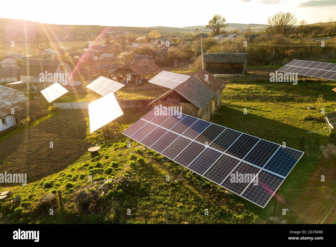 Aerial top down view of solar panels in green rural village yard Stock ...