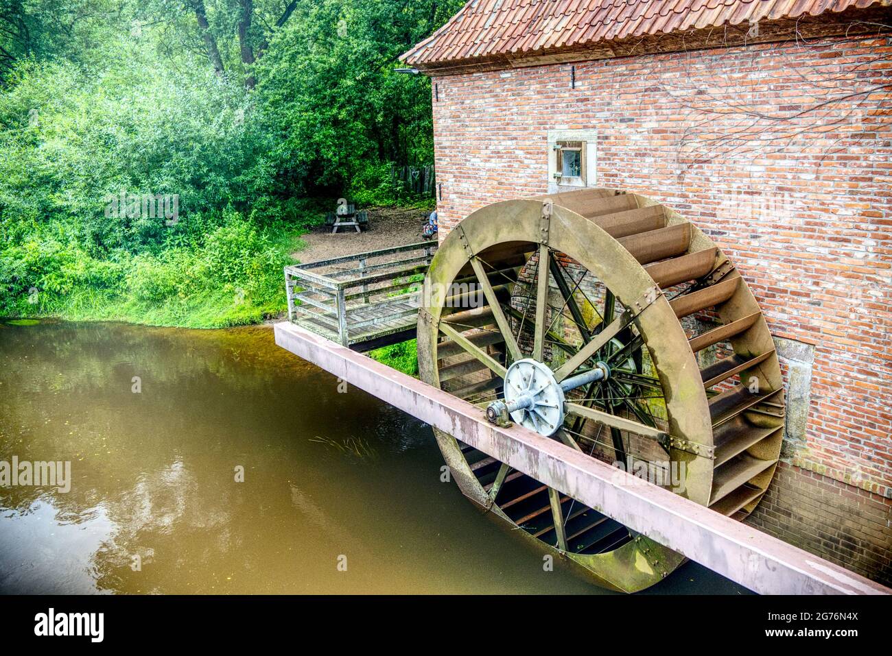 scenic view of a water wheel in the river Stock Photo - Alamy