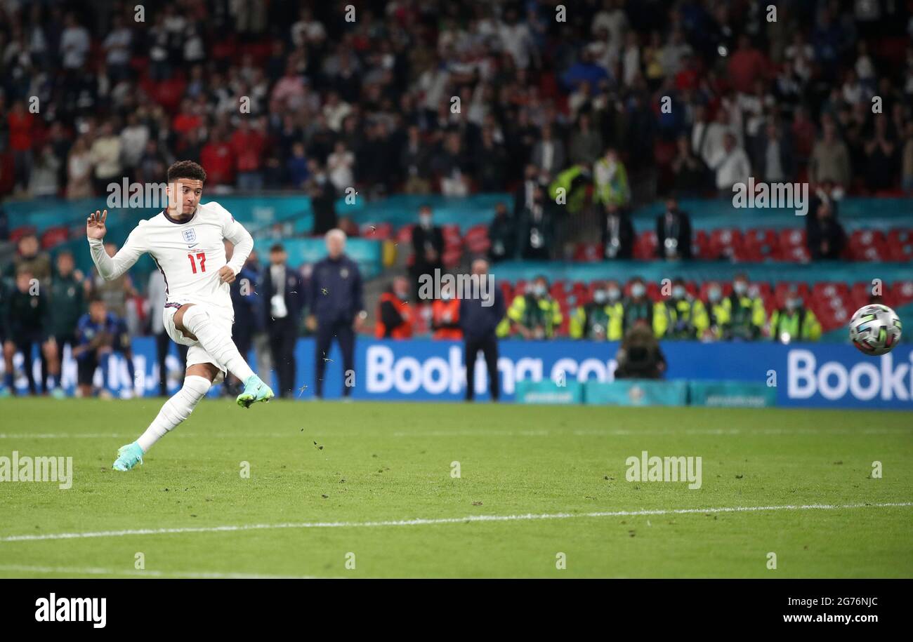 England's Jadon Sancho has his shot saved in the penalty shoot-out ...