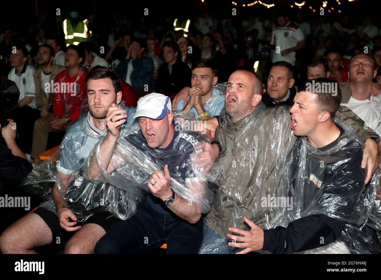 England fans are dejected after England lose the game on penalties at ...