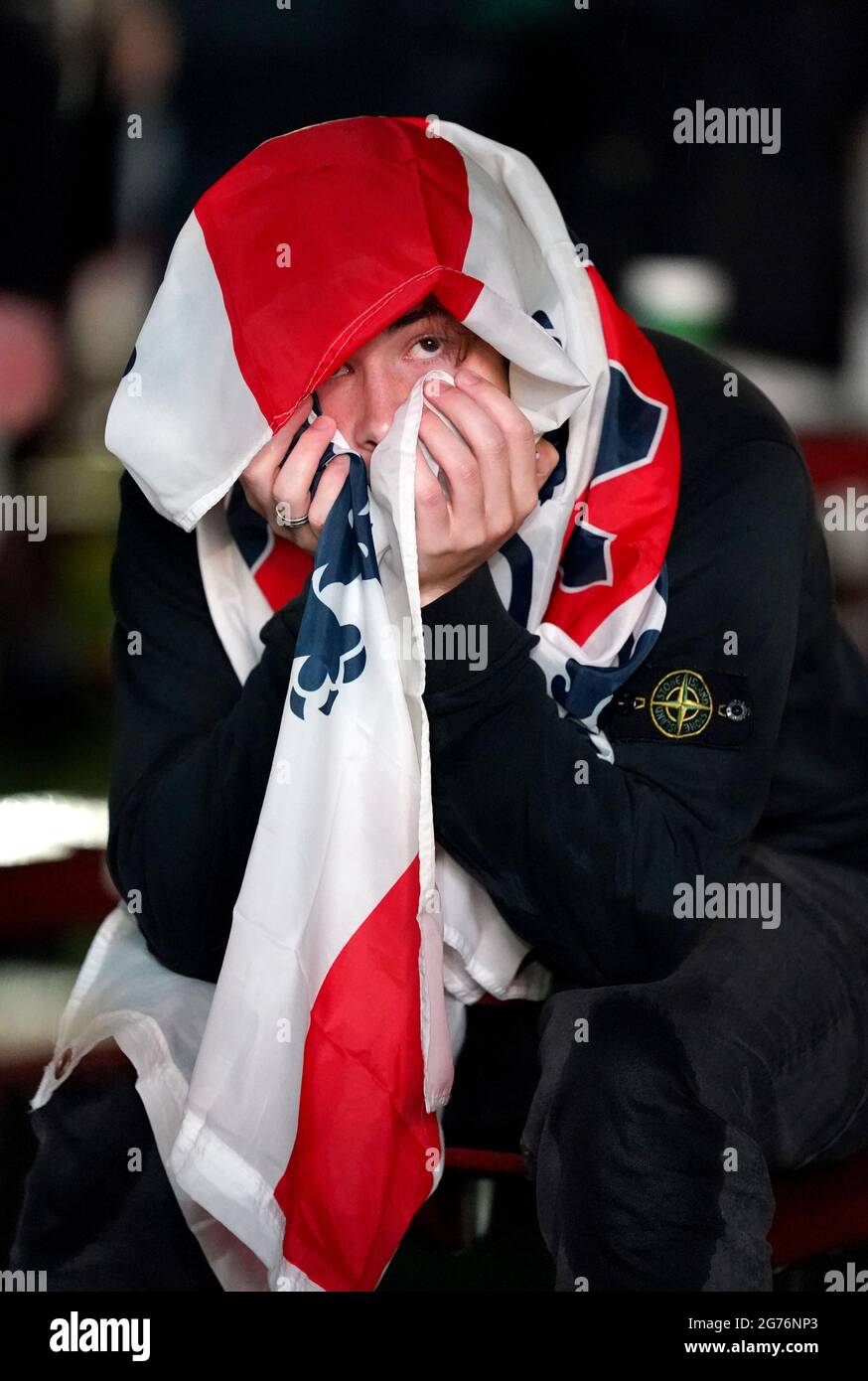 England fans are dejected after England lose the game on penalties at ...