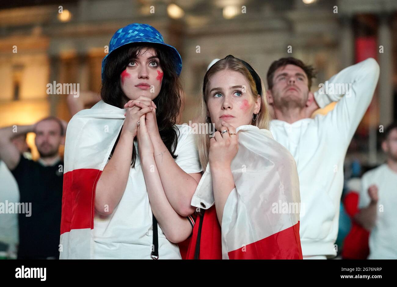 England fans are dejected after England lose the game on penalties at ...