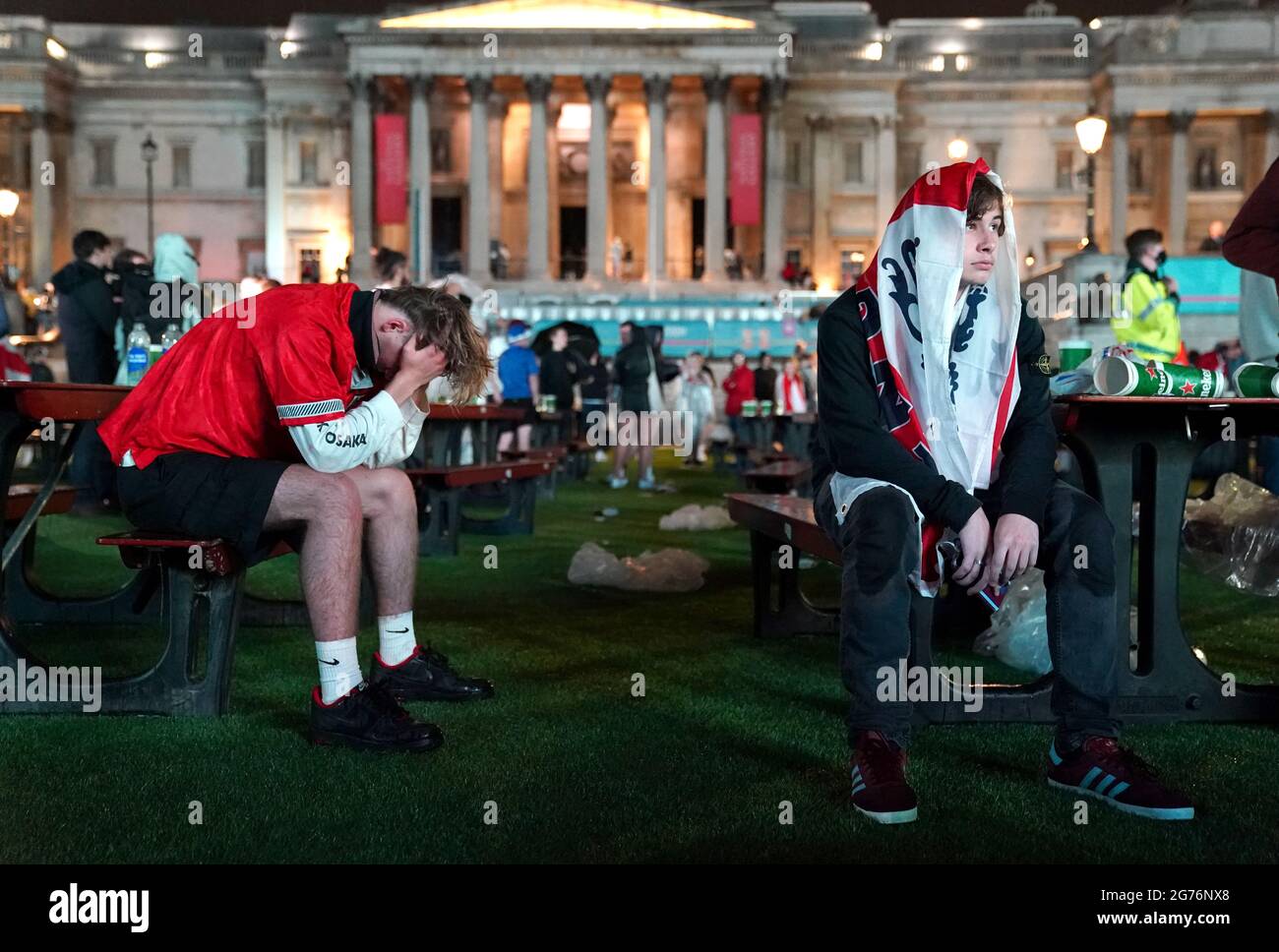 England fans are dejected after England lose the game on penalties at ...