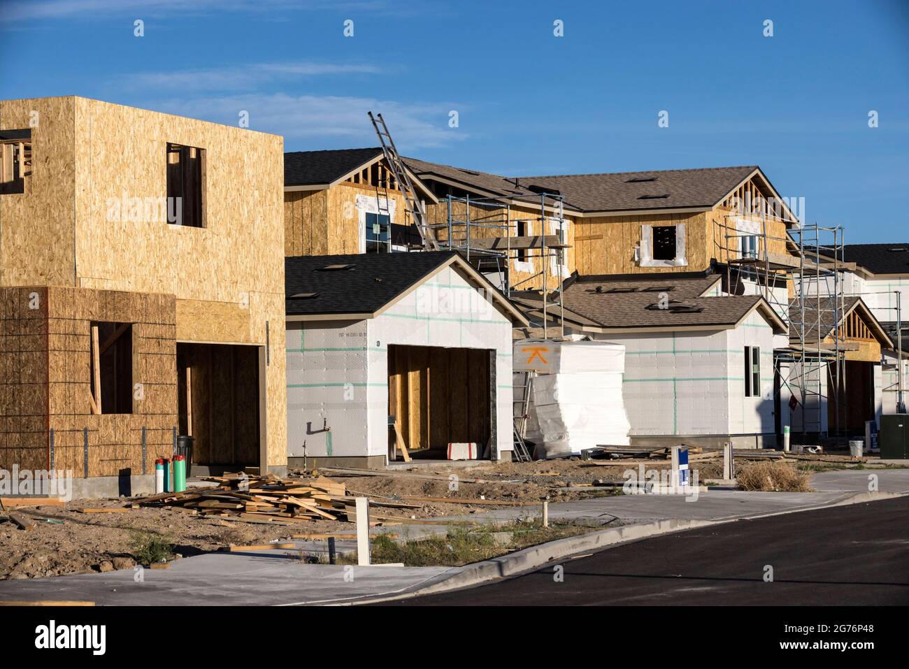 New housing being built in a growing neighborhood Stock Photo - Alamy