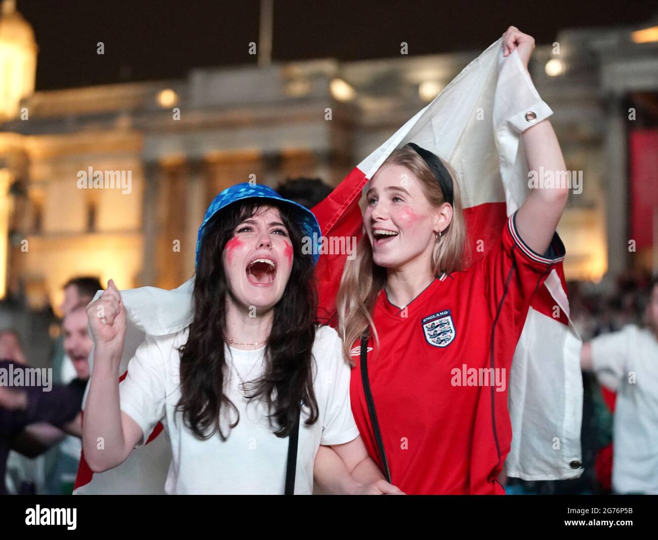 England fans at the Trafalgar Square Fan Zone in London as they watch ...