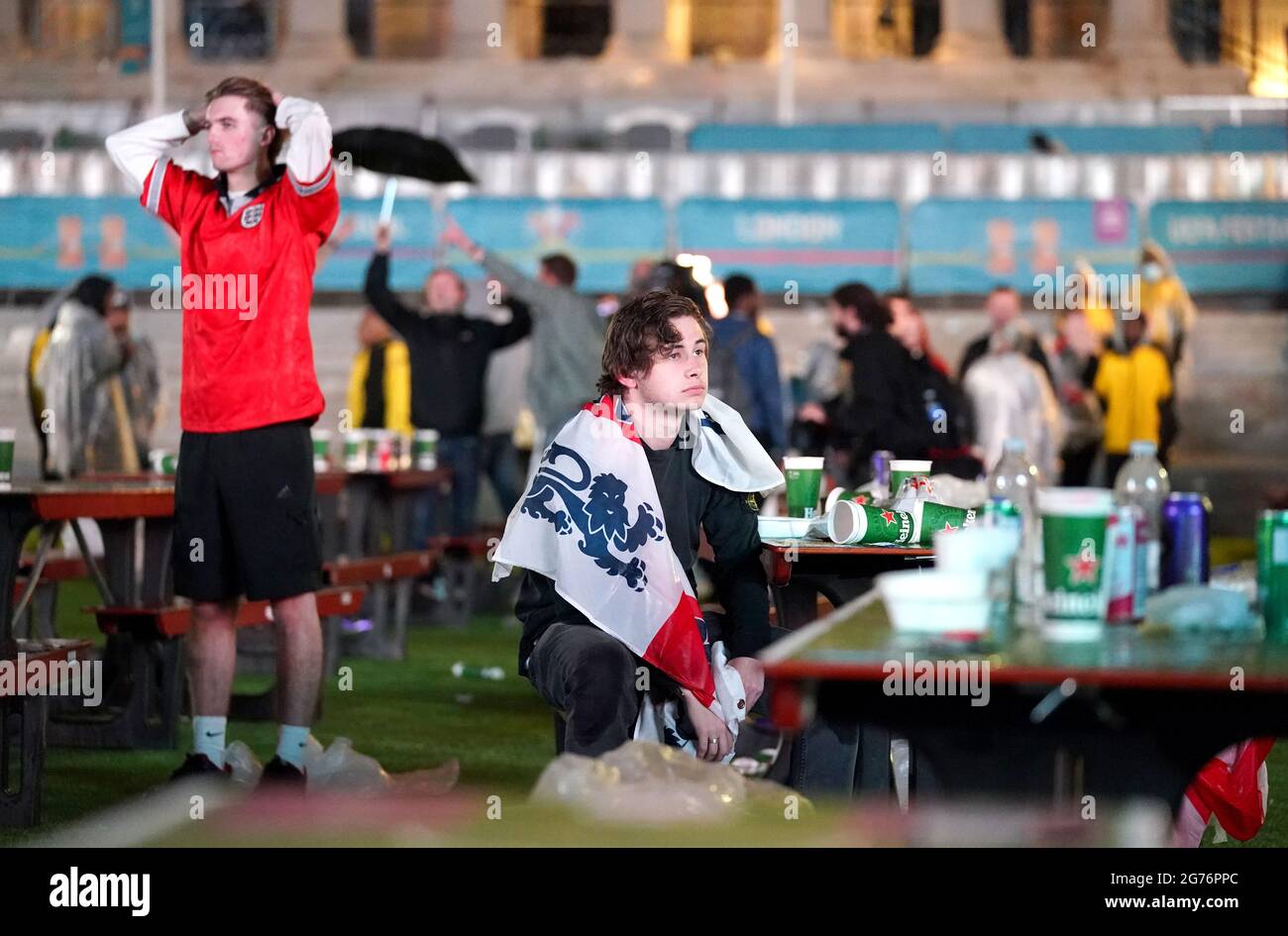 England fans are dejected after England lose the game on penalties at ...