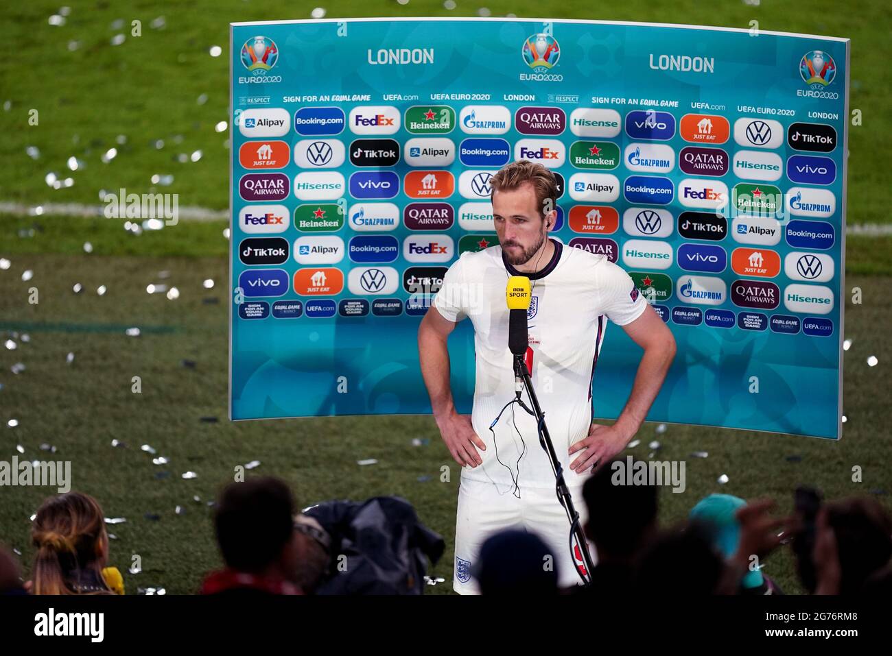 England's Harry Kane stands dejected as he gives his post match ...