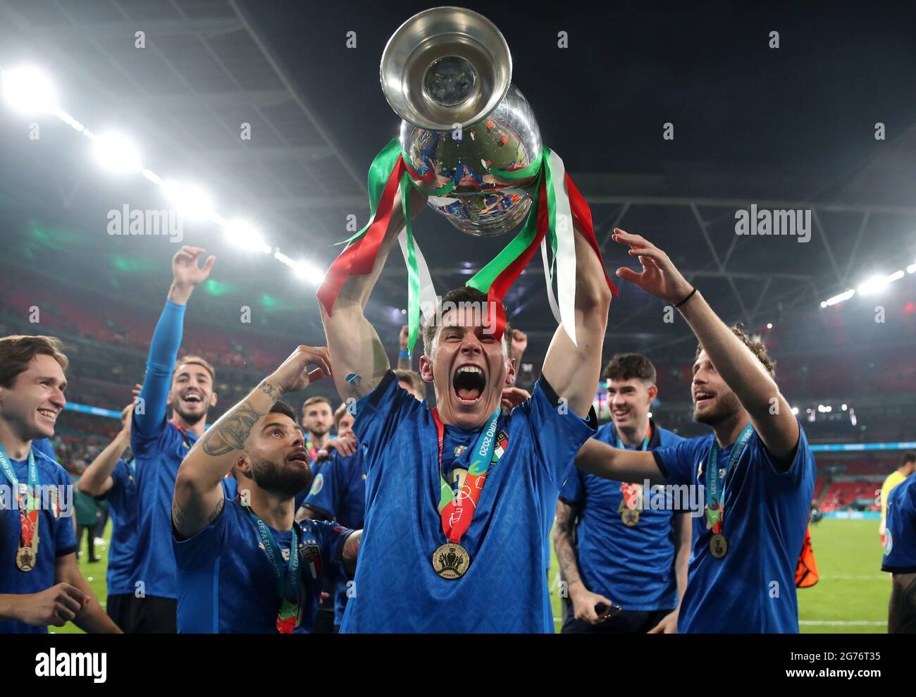 Italy's Matteo Pessina celebrates with the trophy after winning the ...