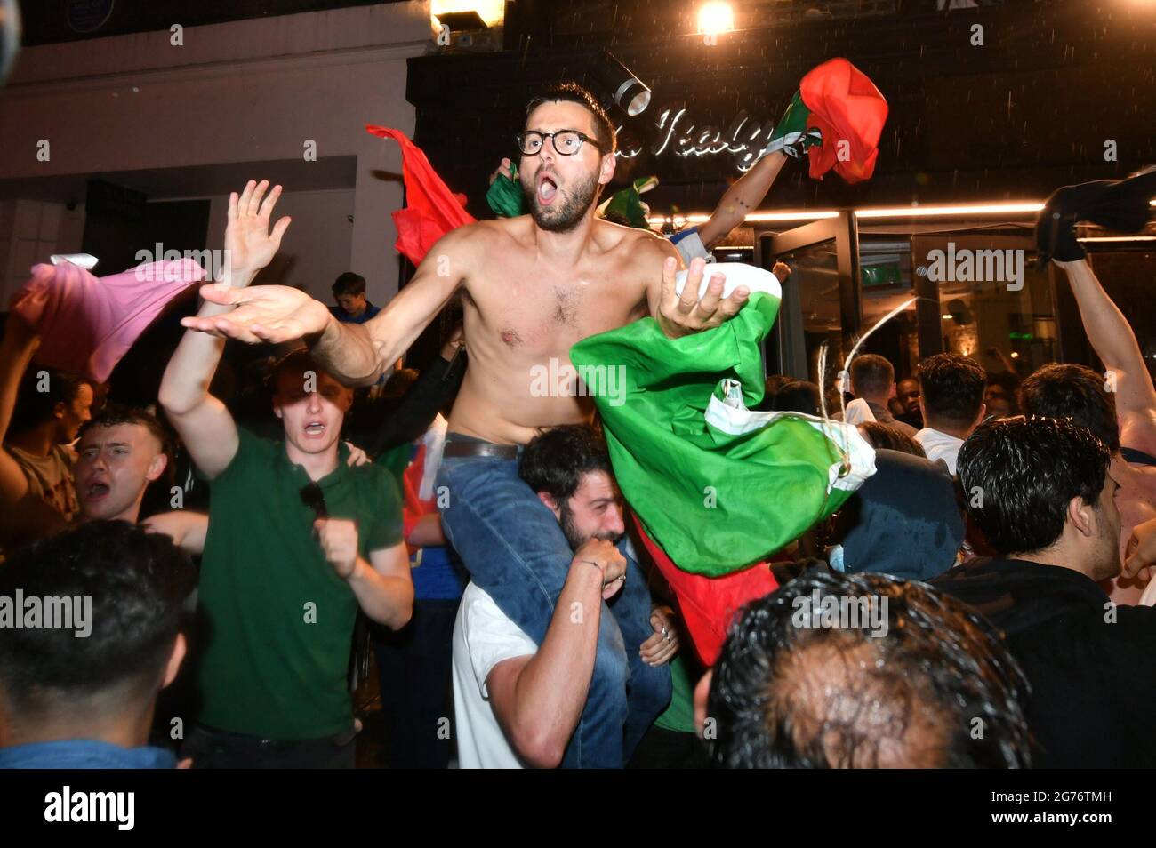 Italy fans celebrating in Soho, London, after Italy beat England on ...