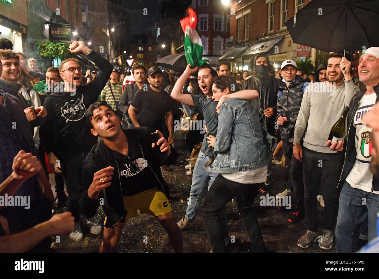 Italy fans celebrating in Soho, London, after Italy beat England on ...