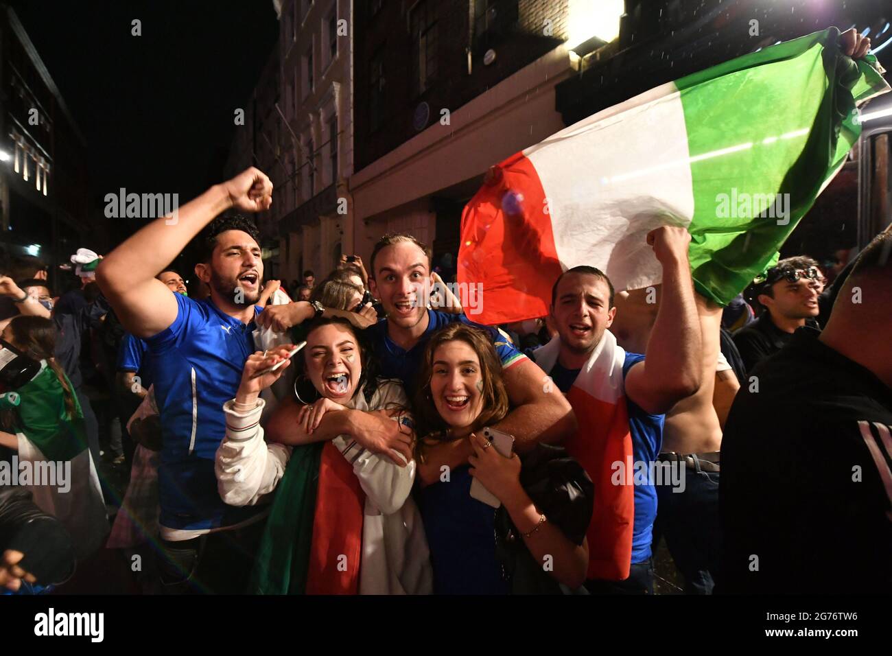 Italy fans celebrating in Soho, London, after Italy beat England on ...