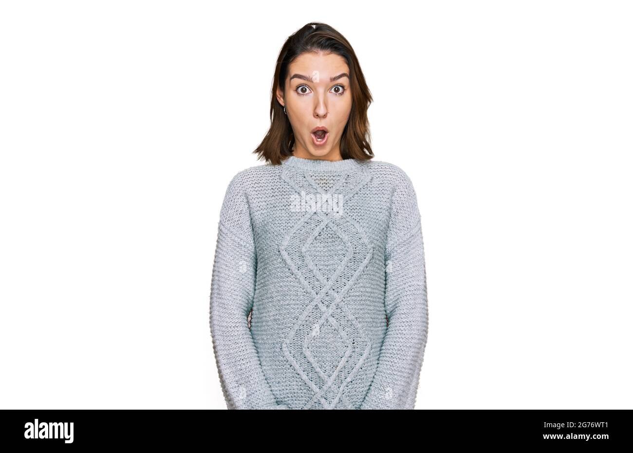 Young caucasian girl wearing casual clothes afraid and shocked with ...