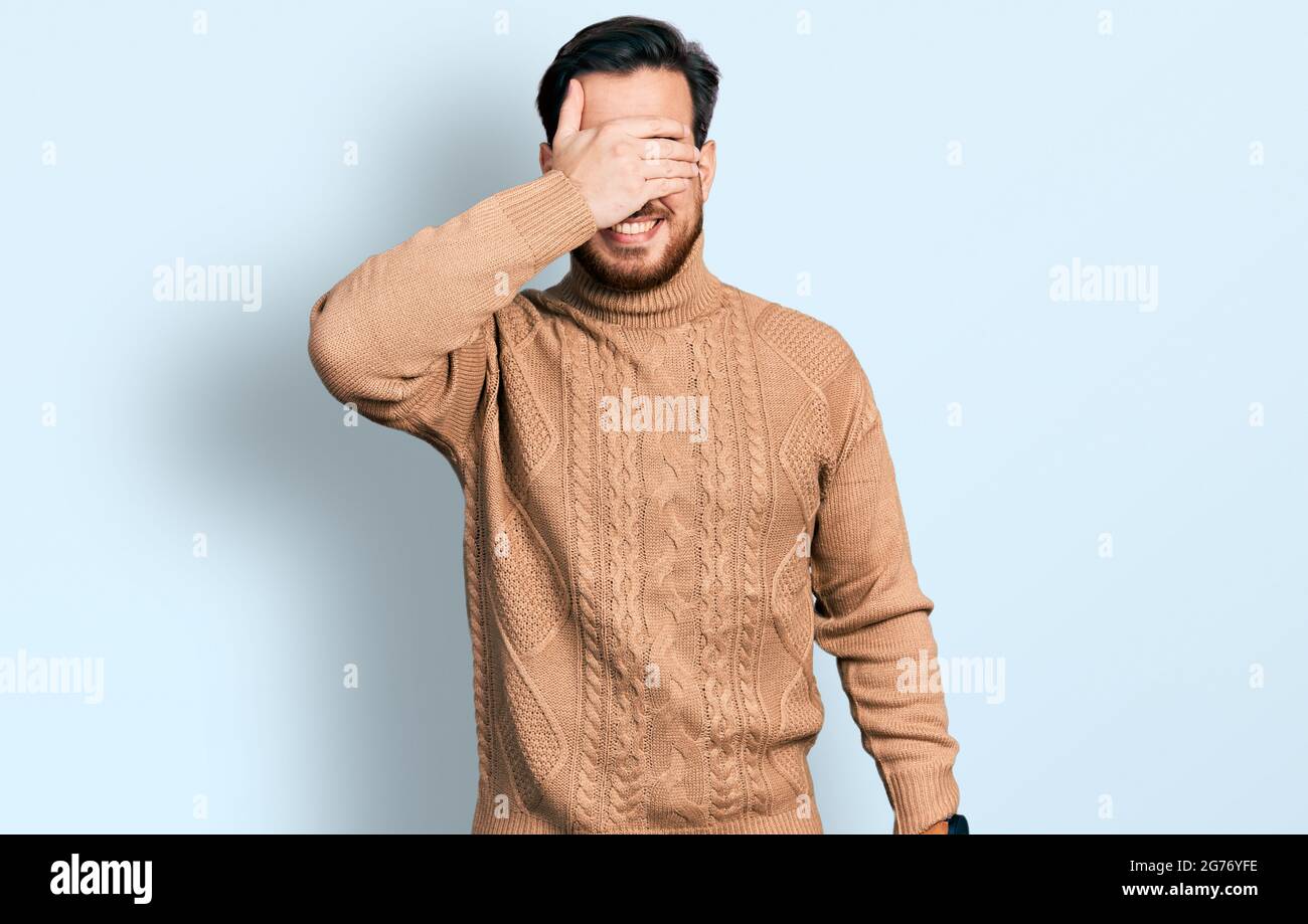 Young hispanic man wearing casual clothes smiling and laughing with ...