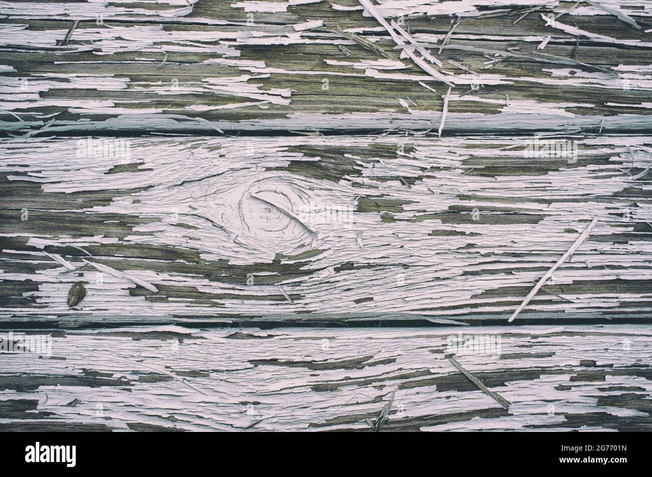 White paint peeling off over wooden surface. Closeup Stock Photo - Alamy