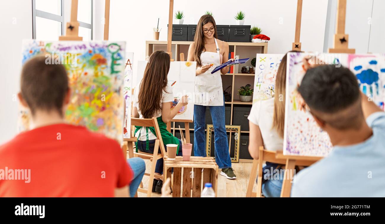 Group of people having paint lesson at art studio Stock Photo - Alamy