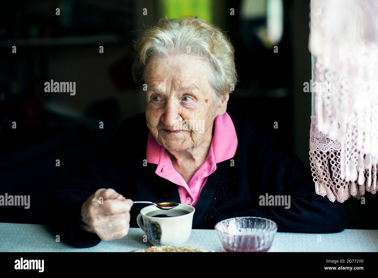 Grandma elderly woman drinking tea hi-res stock photography and images ...