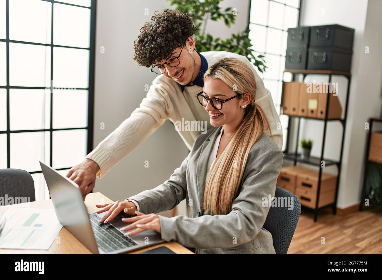 Two business executives working at the office Stock Photo - Alamy