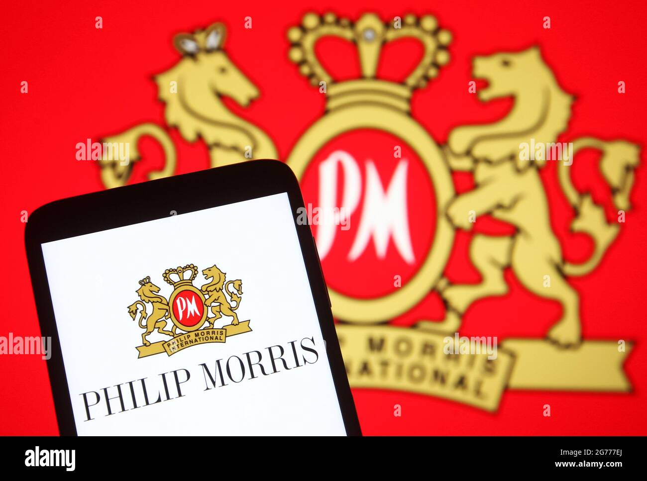 In this photo illustration a Philip Morris International (PMI) logo is ...