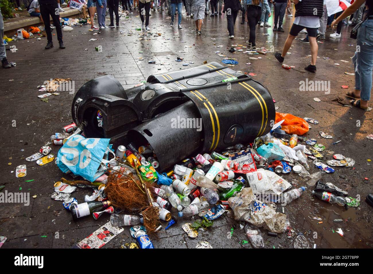 London, UK. 11th July, 2021. England supporters destroy garbage bins ...