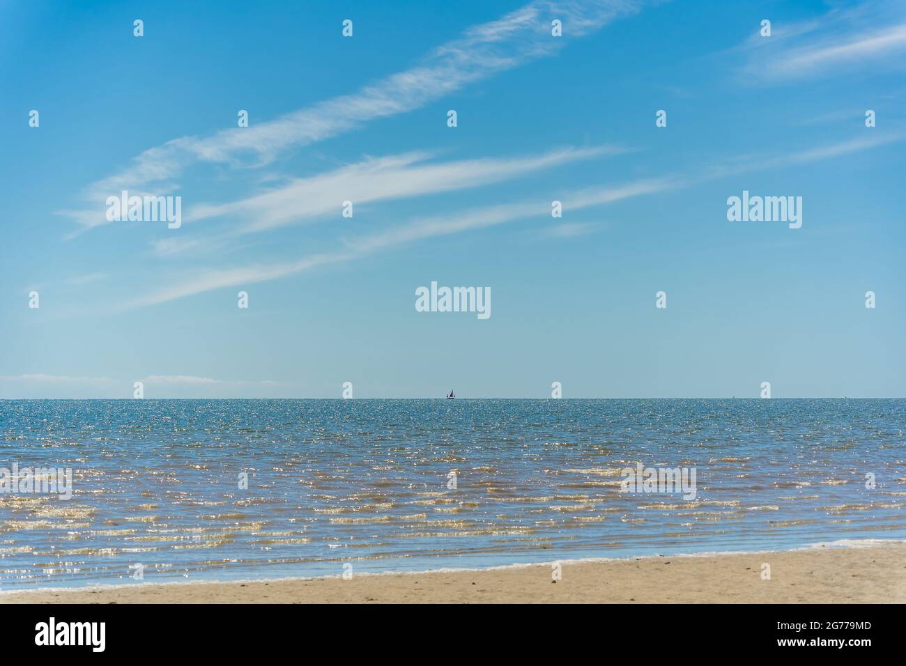 A view of LLansteffan beach in southern Wales with clear transparent ...