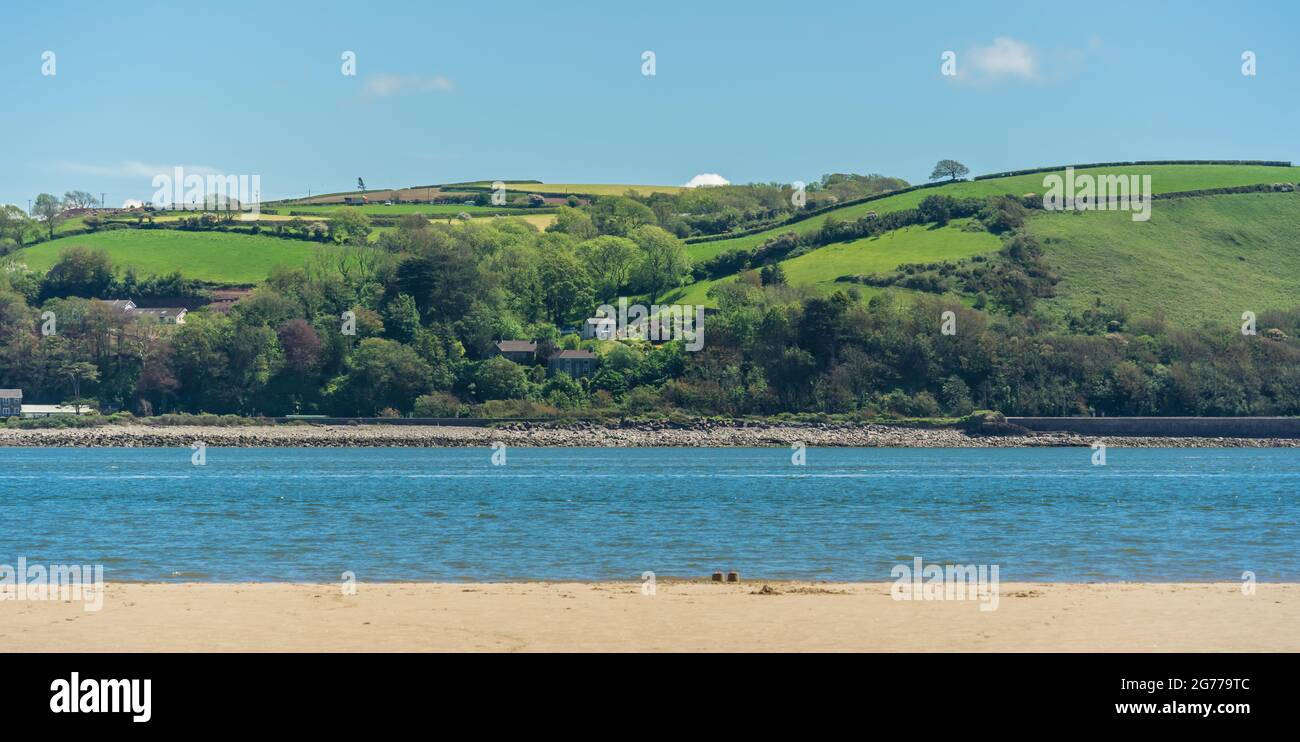 View of LLansteffan beach in southern Wales surrounded by sand and ...