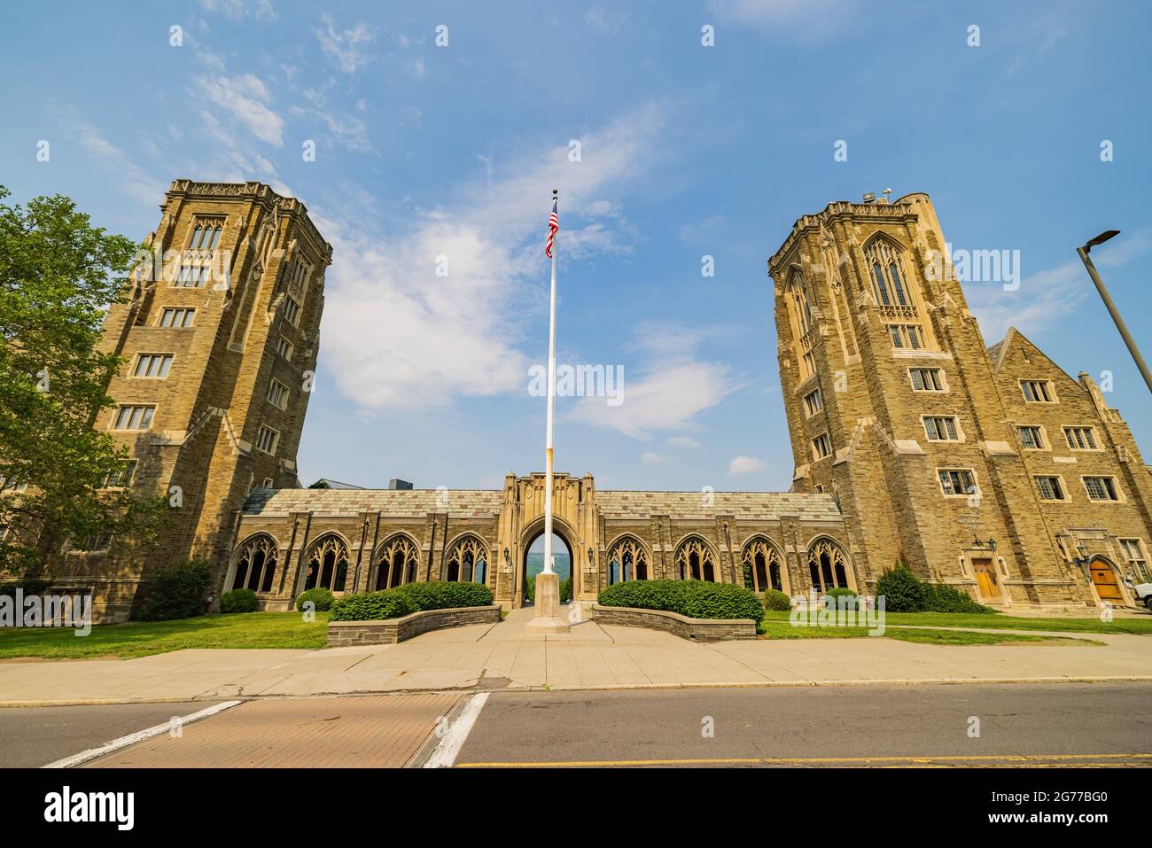 Sunny exterior view of the War Memorial building of Cornell University ...