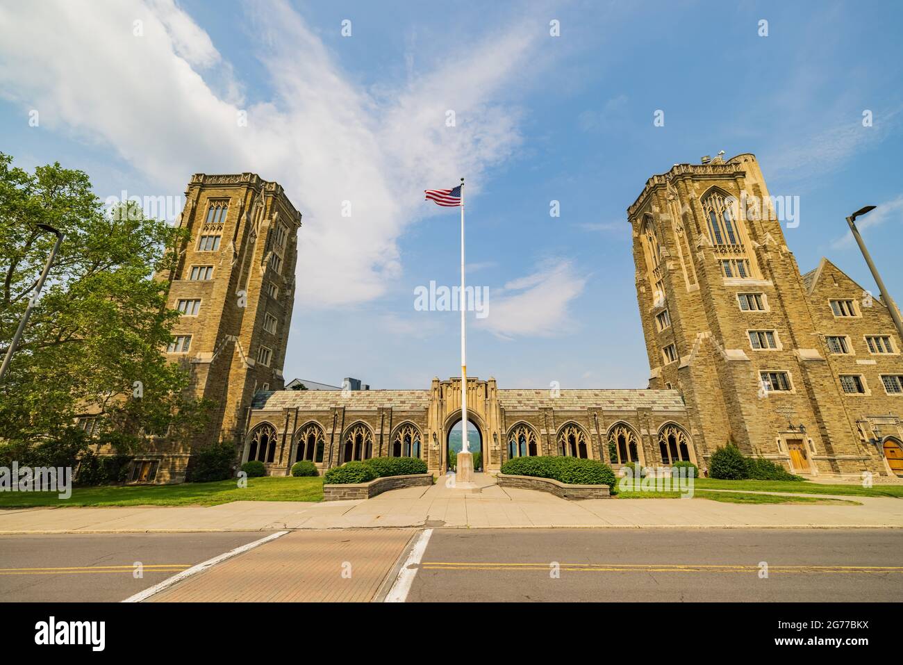 Sunny exterior view of the War Memorial building of Cornell University ...