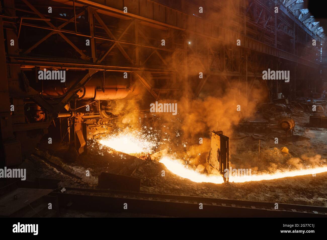 Blast furnace, cast iron production. Metal poured out of the ...
