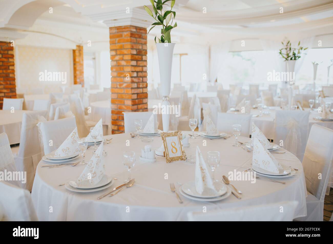 Beautiful table setup in a hall for a wedding ceremony Stock Photo - Alamy