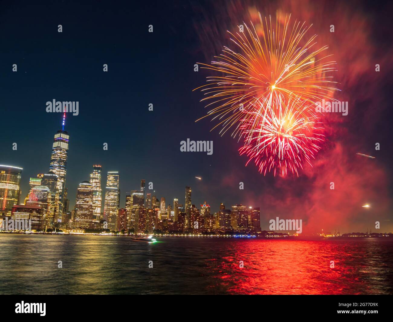 Fireworks celebration of July 4th with the famous Manhattan skyline at ...
