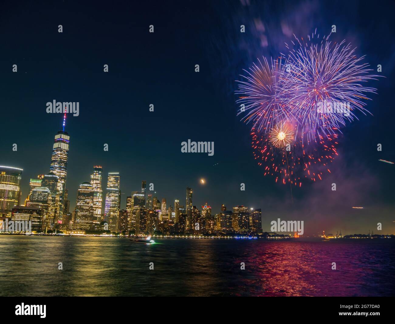 Fireworks celebration of July 4th with the famous Manhattan skyline at ...