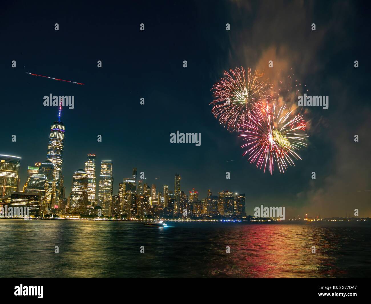 Fireworks celebration of July 4th with the famous Manhattan skyline at ...