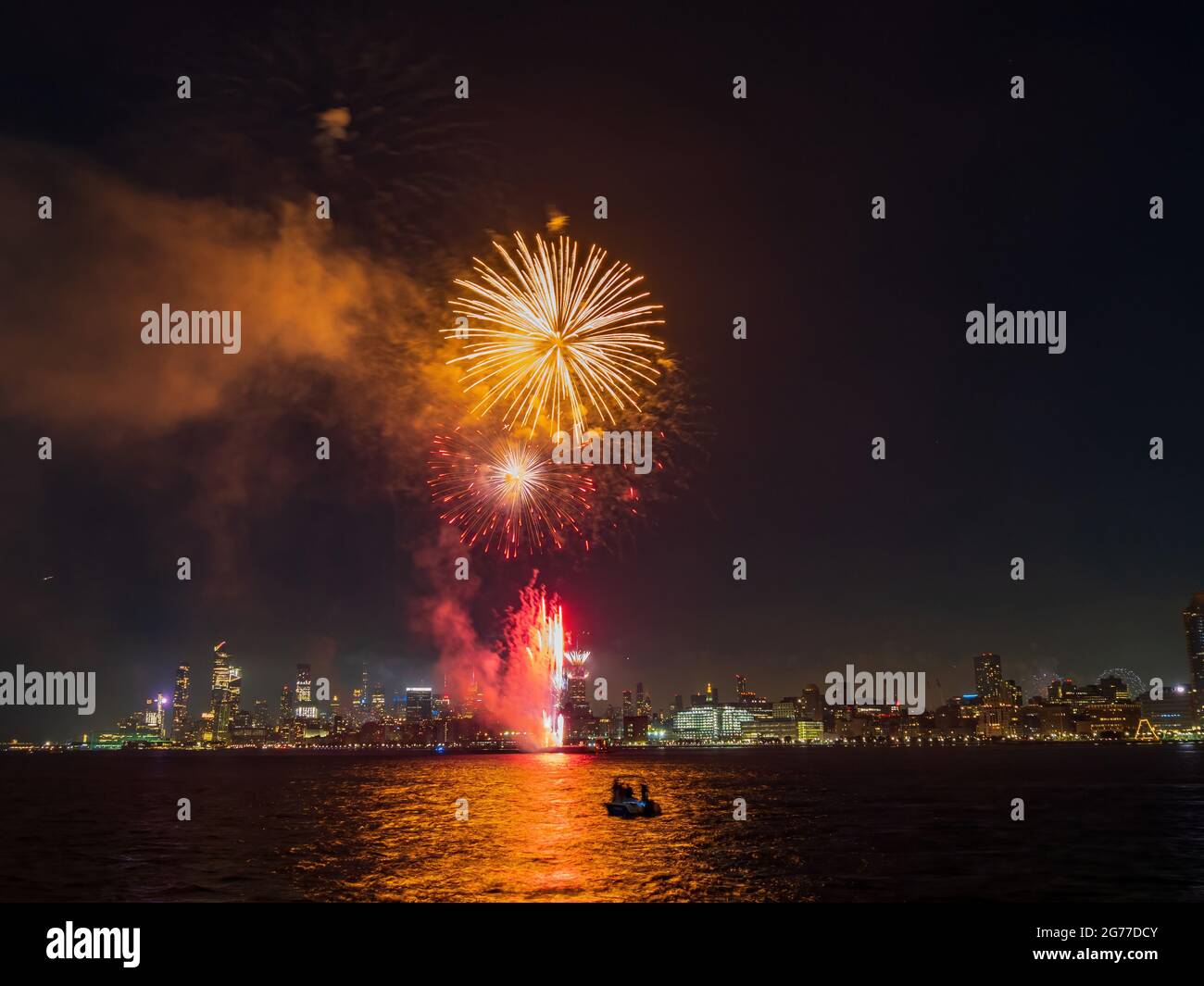 Fireworks celebration of July 4th with the famous Manhattan skyline at ...