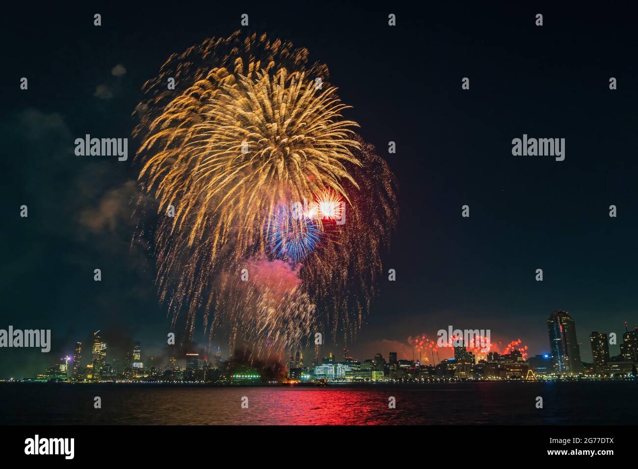 Fireworks celebration of July 4th with the famous Manhattan skyline at ...