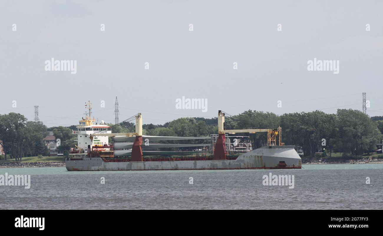Transport cargo ship moving in lake waters Stock Photo - Alamy