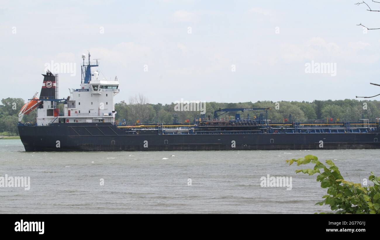 Transport cargo ship moving in lake waters Stock Photo - Alamy