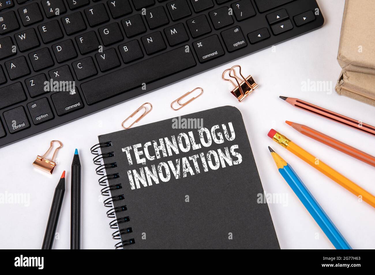 Technology innovations. Computer keyboard, notebook and office supplies ...