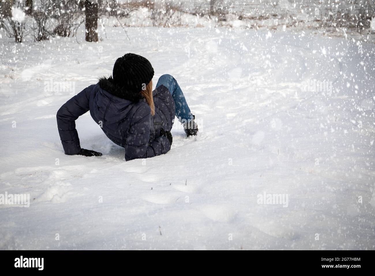 Slip on the slippery ice and snow on the road. Snowfall and weather ...
