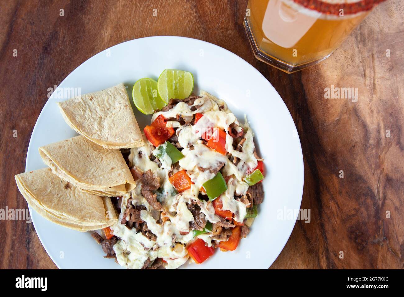 Top view of alambre food with a tortilla wraps on a plate Stock Photo ...