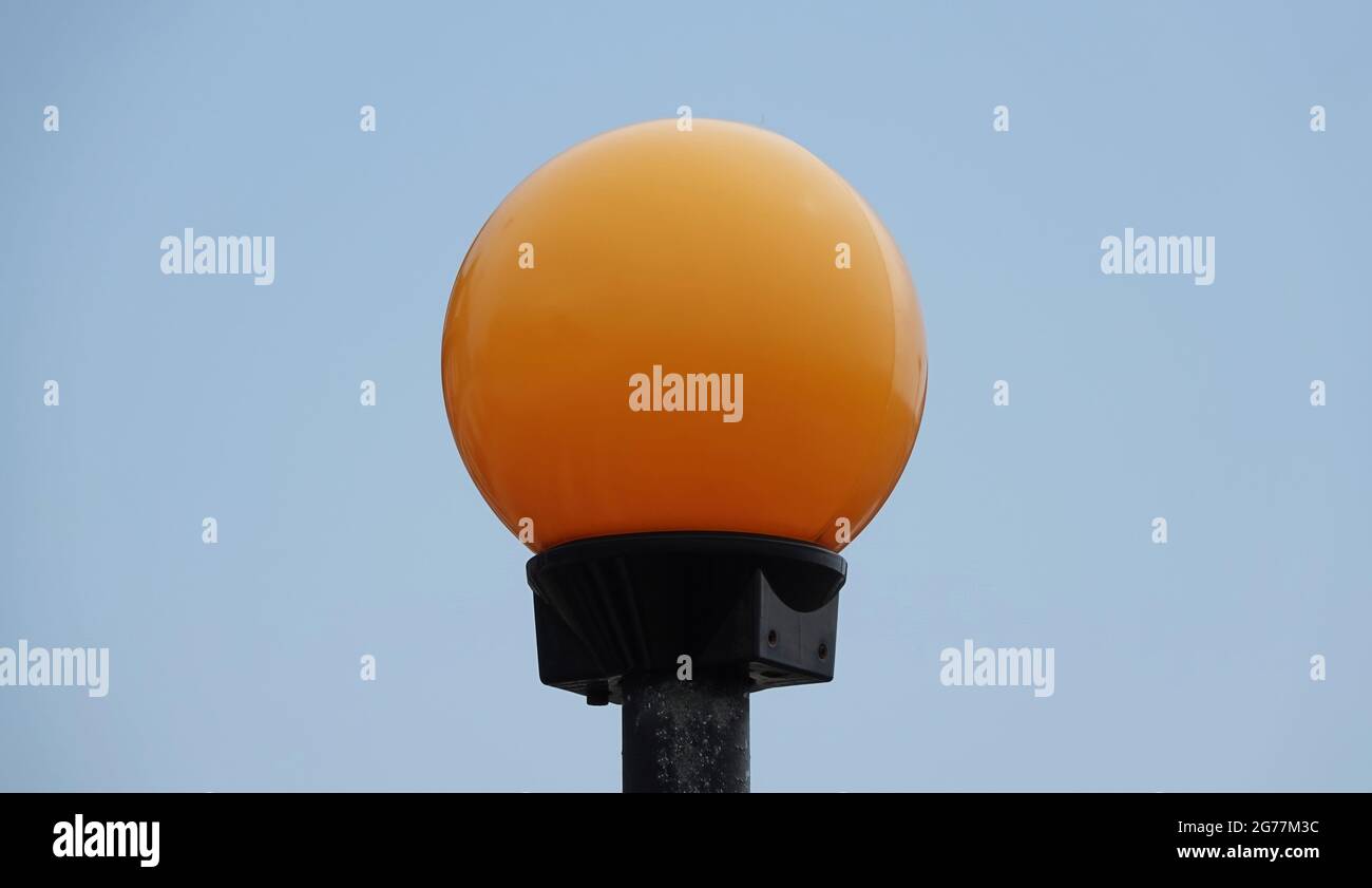 Closeup shot of a Belisha beacon on a blue sky background Stock Photo ...