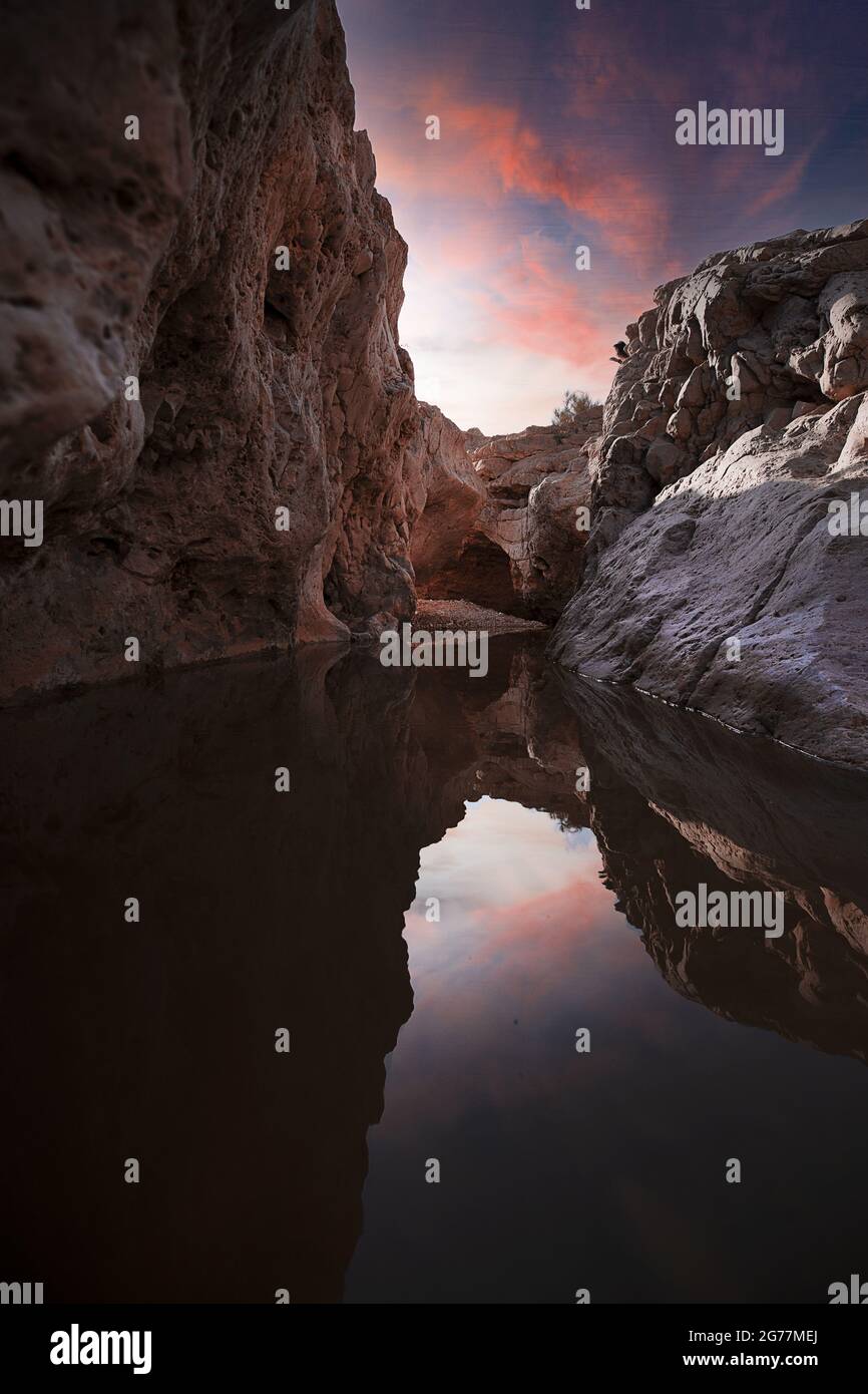 NEGEV, ISRAEL - Mar 10, 2021: A calm river with a reflection of the ...