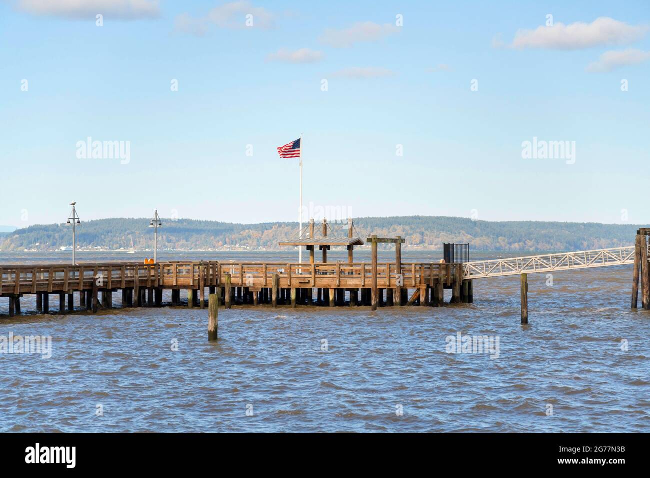 Waterfront pier at Tacoma in Washington with a USA flag Stock Photo - Alamy
