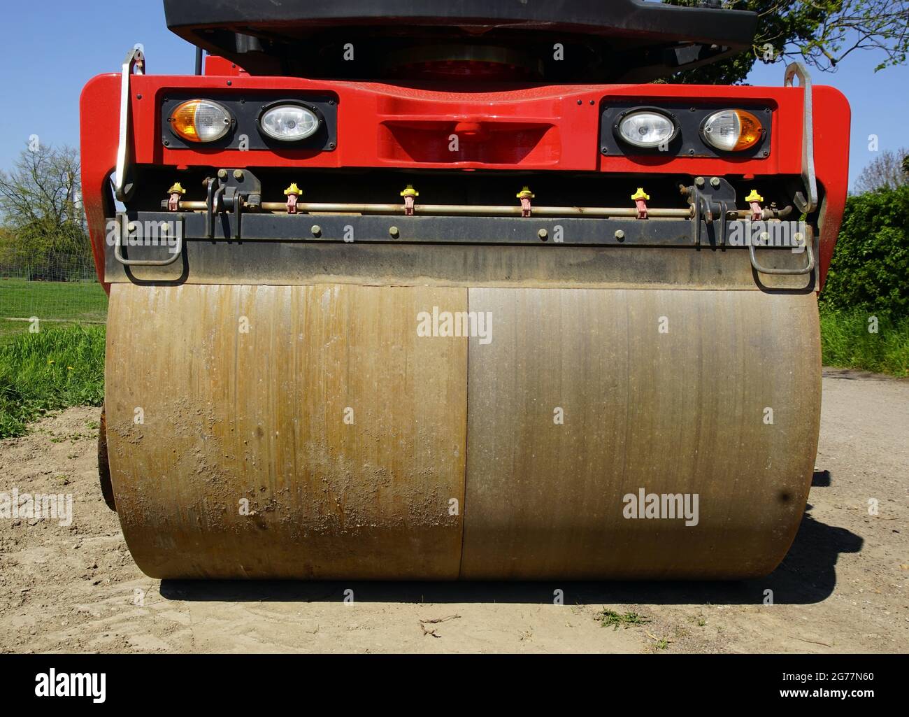 Tandem roller working in a rural field Stock Photo - Alamy