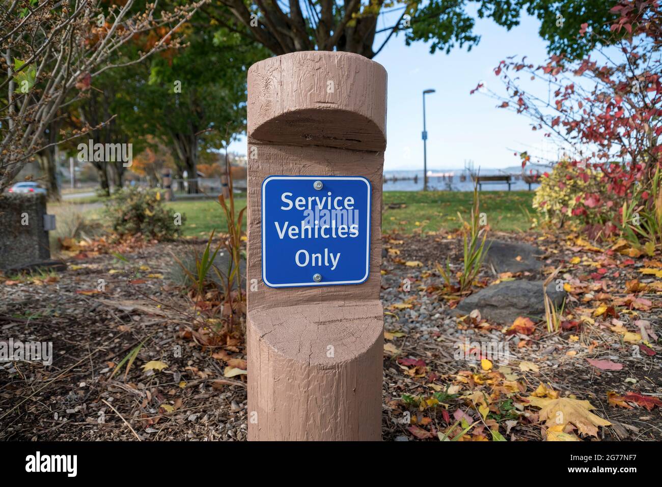 Public signage on a decorative short log post at Tacoma, Washington ...