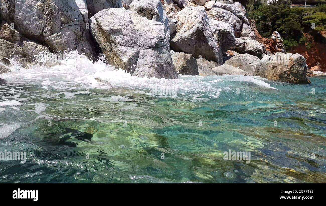 Small waves crash on shore hi-res stock photography and images - Alamy