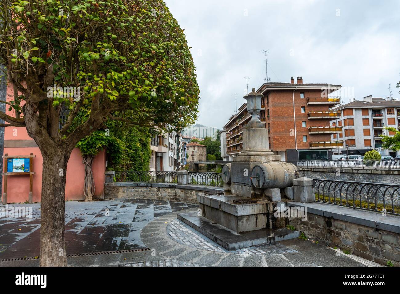 Traditional local houses in the town of Azkoitia next to the Urola ...