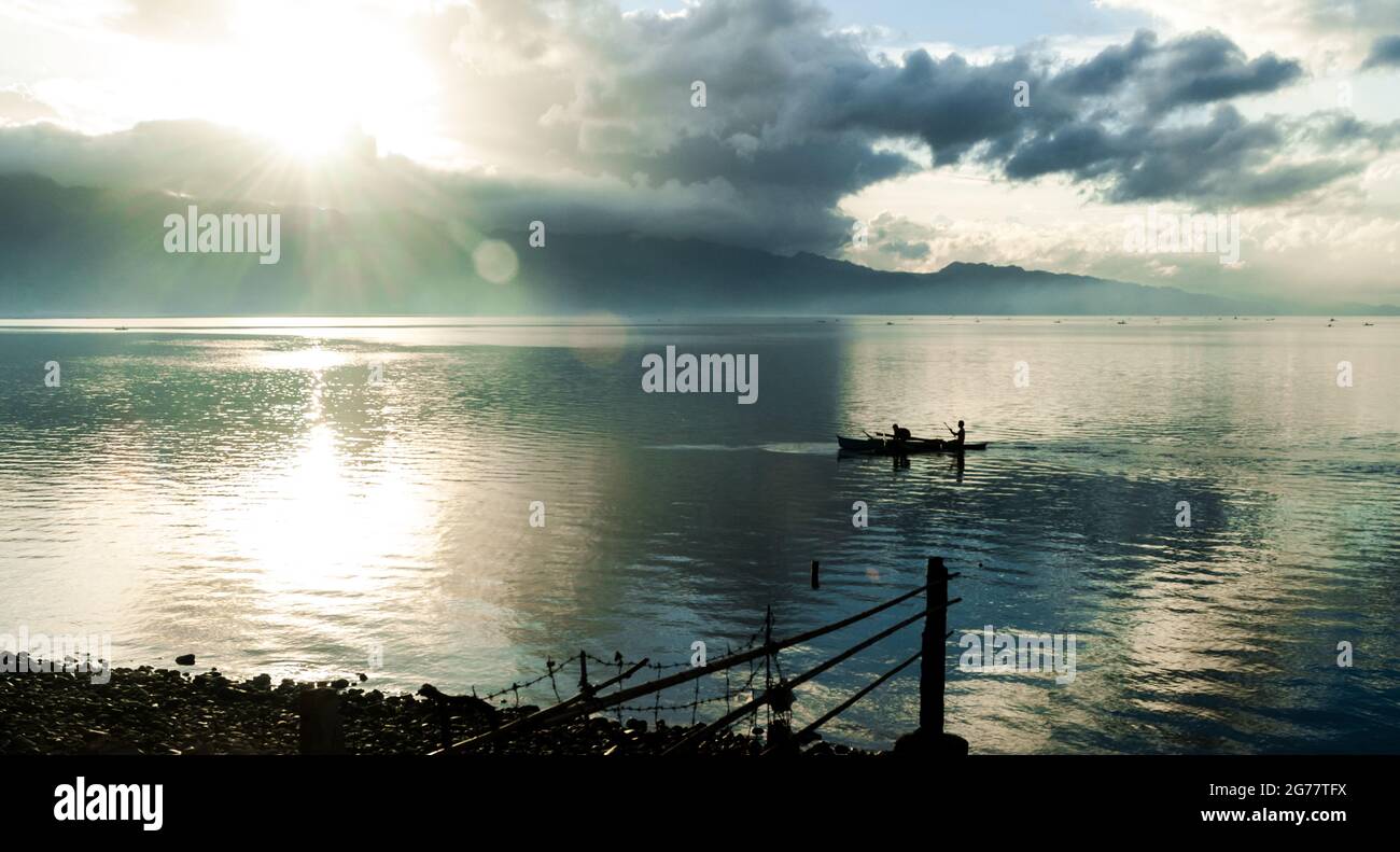 Silhouette on fishing boat hi-res stock photography and images - Alamy