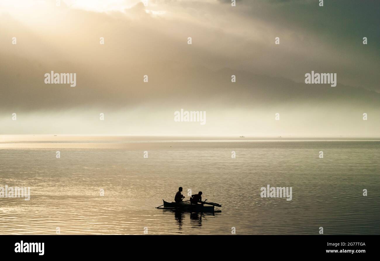 Silhouette on fishing boat hi-res stock photography and images - Alamy